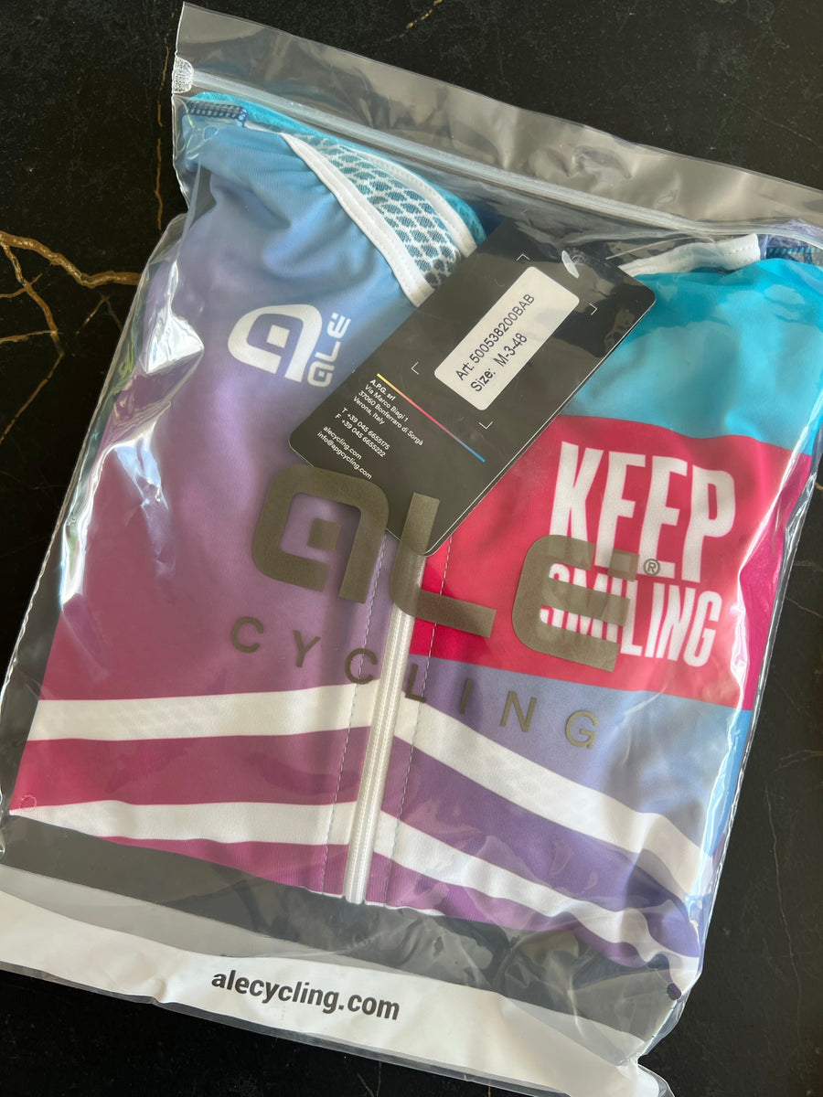 Keep Smiling Tri-dragt